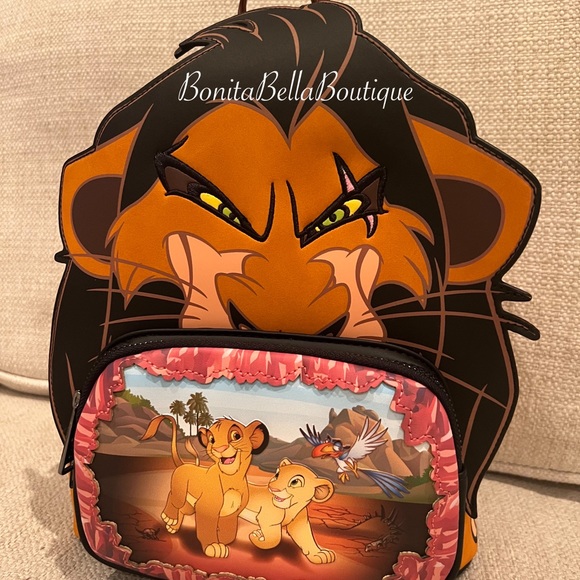 Loungefly | Bags | The Loungefly Disney Lion King Villains Scar Mini ...